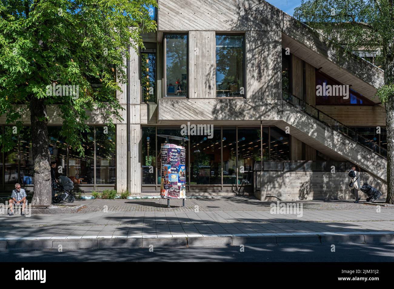 Main street Drottninggatan and the City Library in the city center of ...