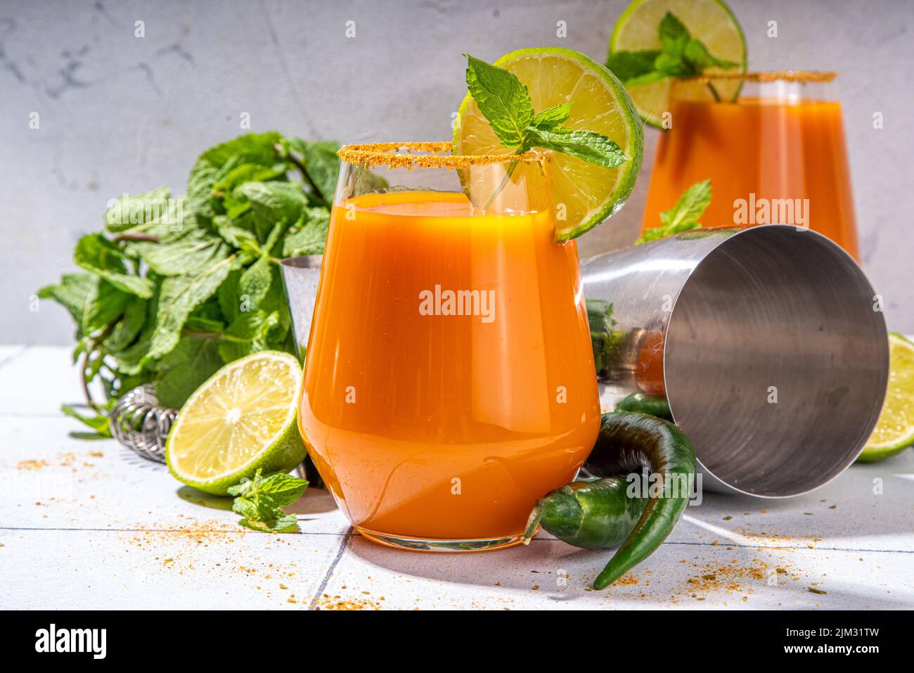 Carrot Ginger Margarita cocktail with lime, mint and hot chili pepper ...
