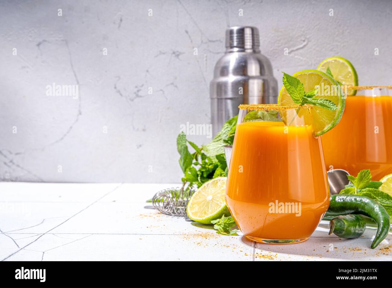Carrot Ginger Margarita cocktail with lime, mint and hot chili pepper ...