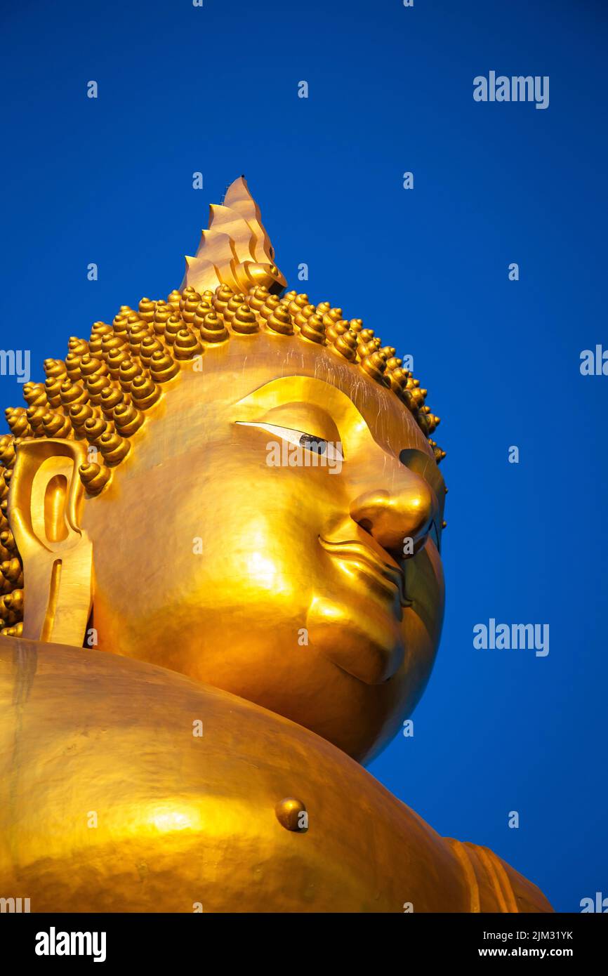 Big Buddha during sunset at Wat Muang in Ang Thong, Thailand Stock ...