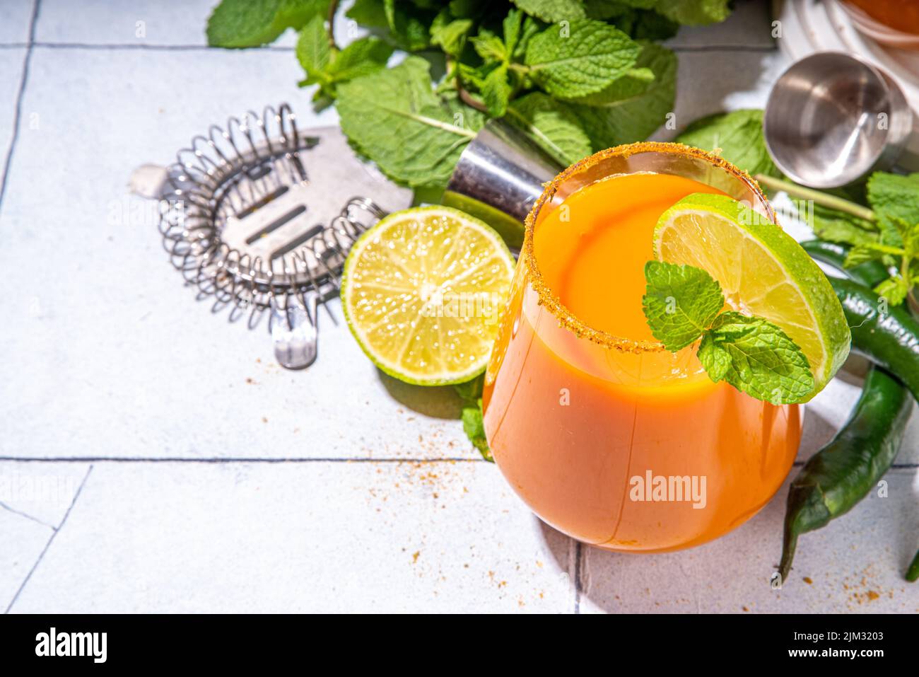 Carrot Ginger Margarita cocktail with lime, mint and hot chili pepper ...