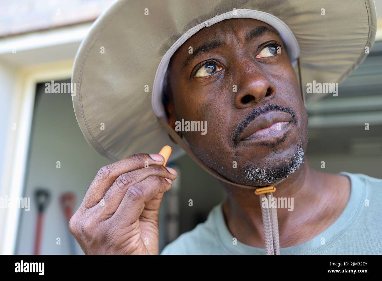 Human ear african american hi-res stock photography and images - Alamy