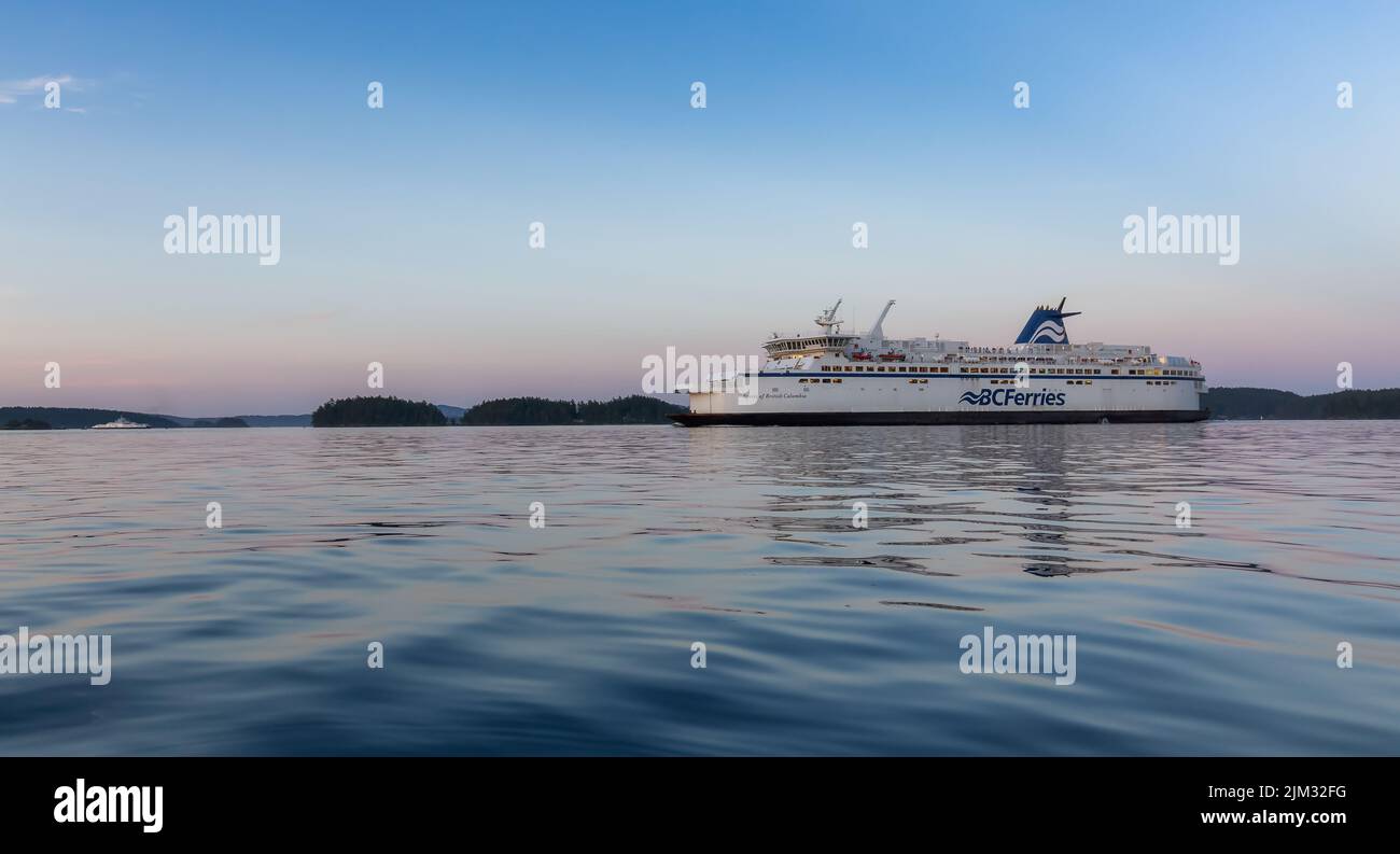 BC Ferries Boat leaving the Terminal in Swartz Bay during colorful ...