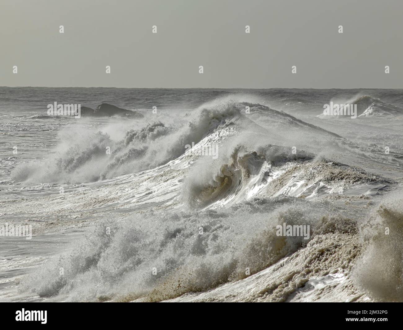Rough sea day seeing big breaking waves Stock Photo - Alamy
