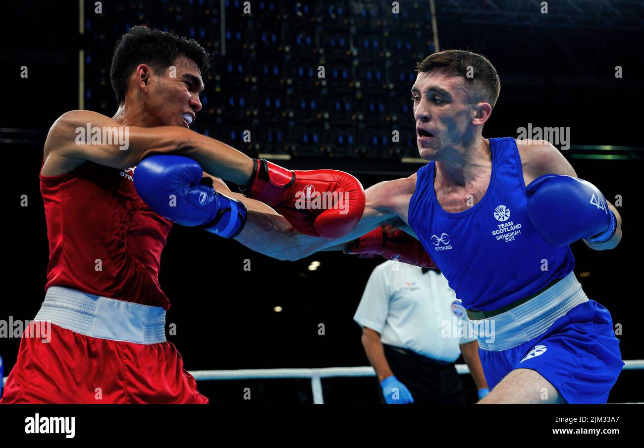 Malaysia's Muhammad Imdad Ahmad Shaharom (Red) and Scotland's Matthew ...
