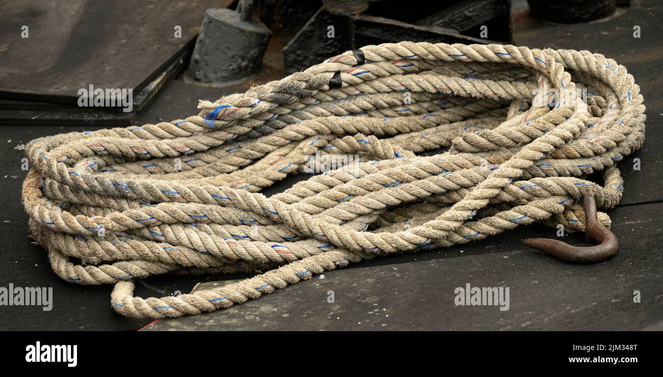 A hawser (rope) on the foredeck of the tugboat Danielle Stock Photo - Alamy