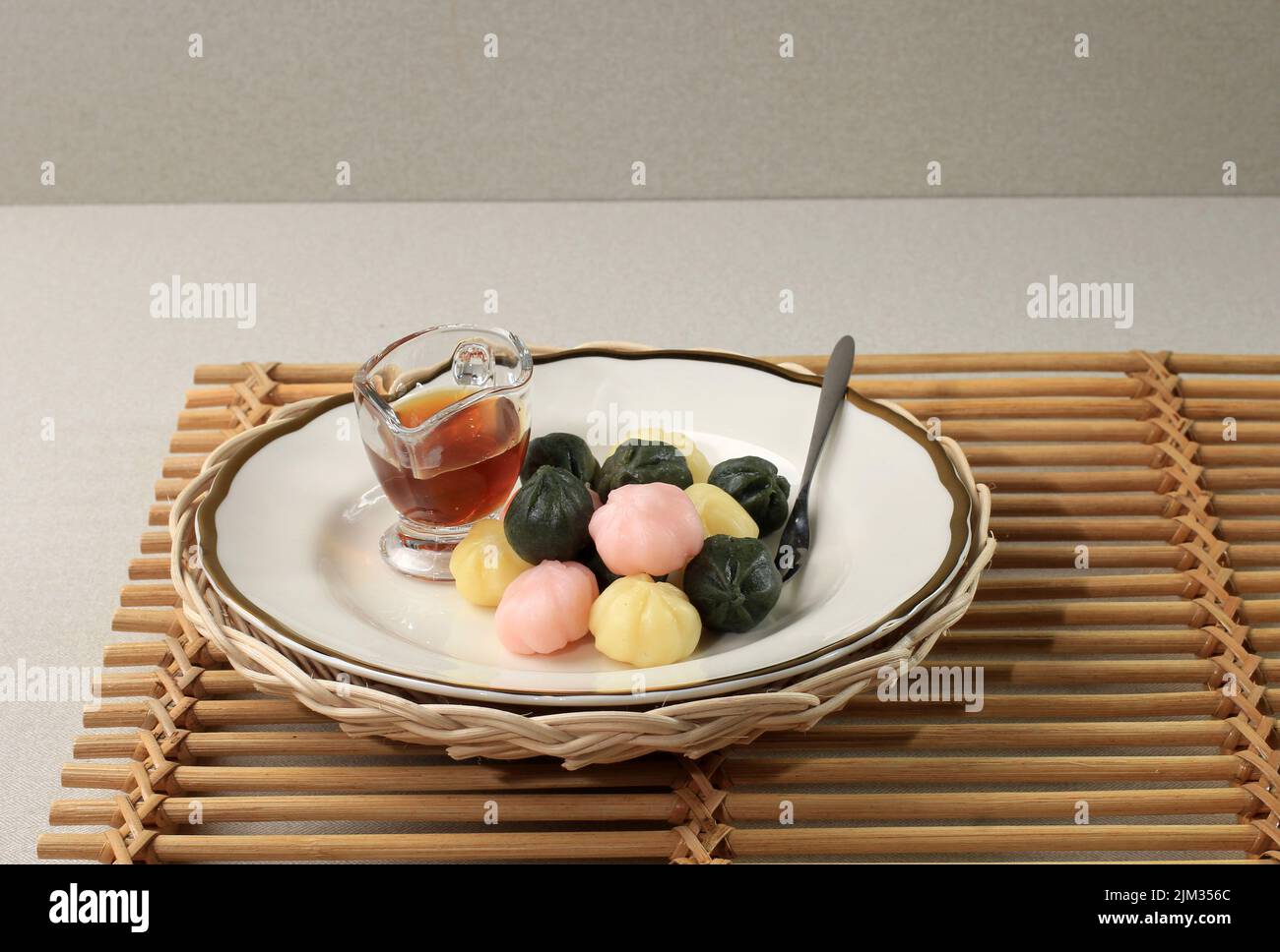 Kkultteok is Ball Shaped Rice Cake Filled with Honey and Sesame Syrup ...