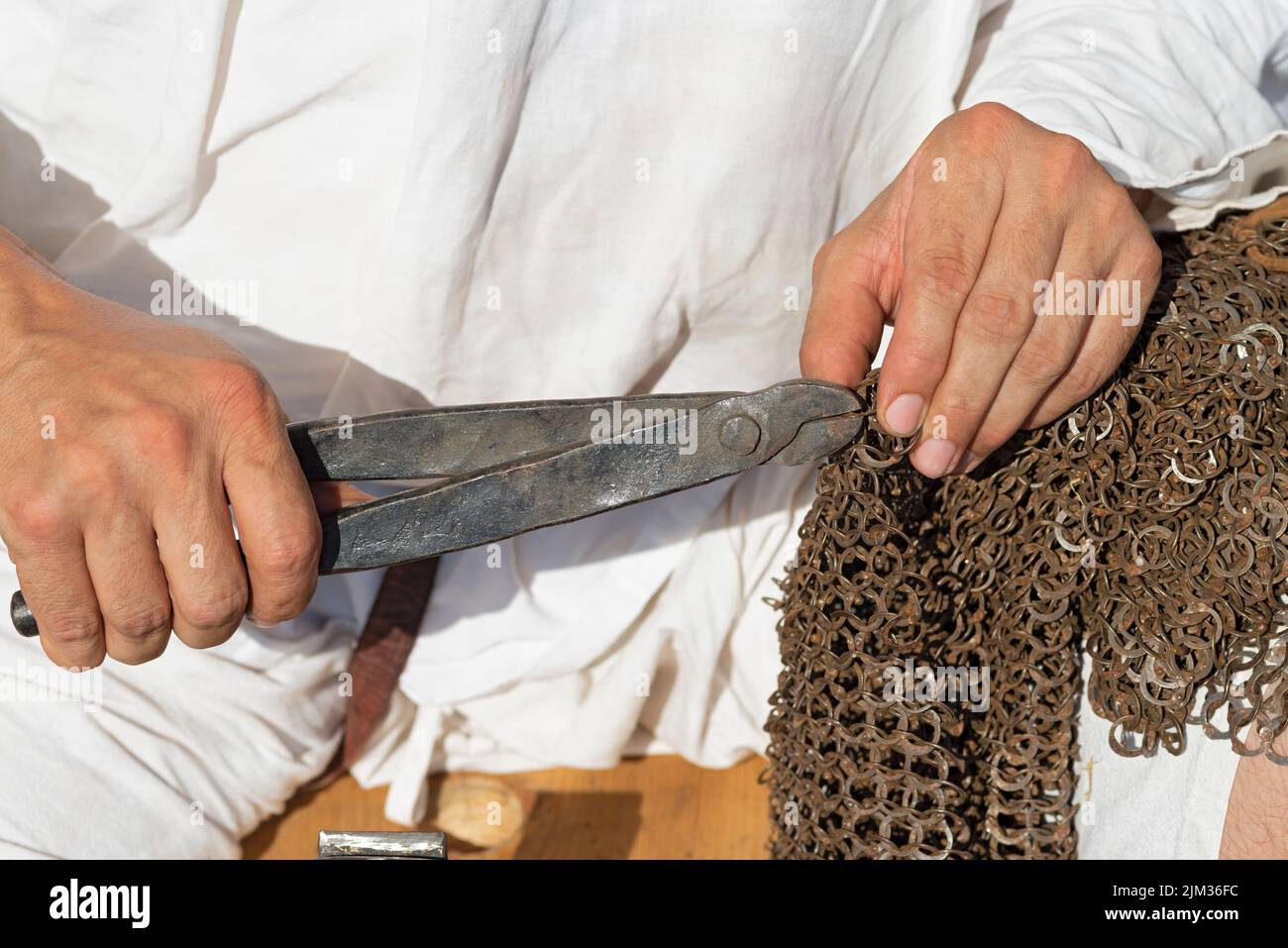 Italy, Lombardy, Historical Reenactment Medieval, Artisan Creates Chain ...