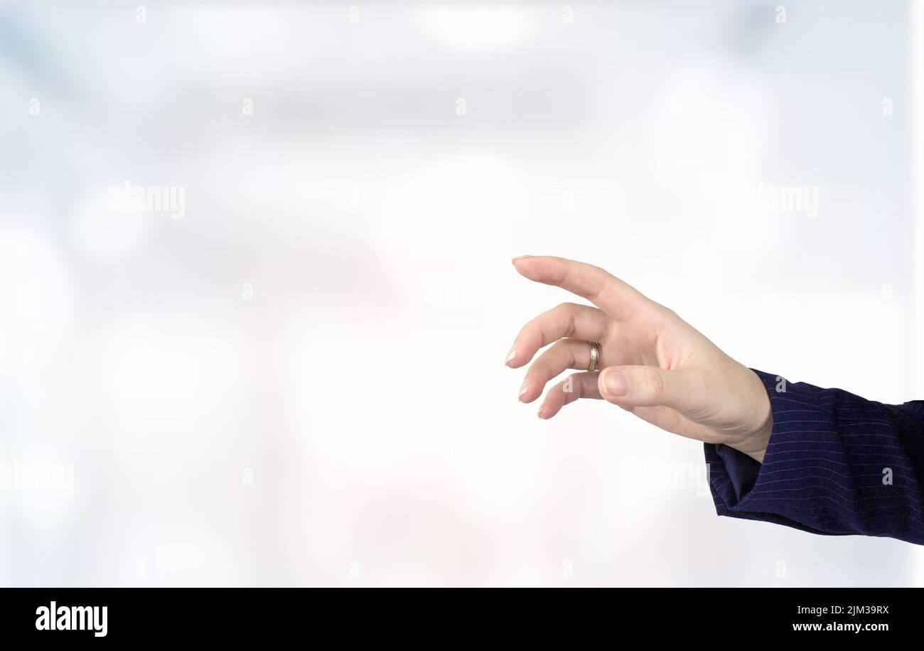 Hand pushing a button on a touch screen interface. Hand touching ...