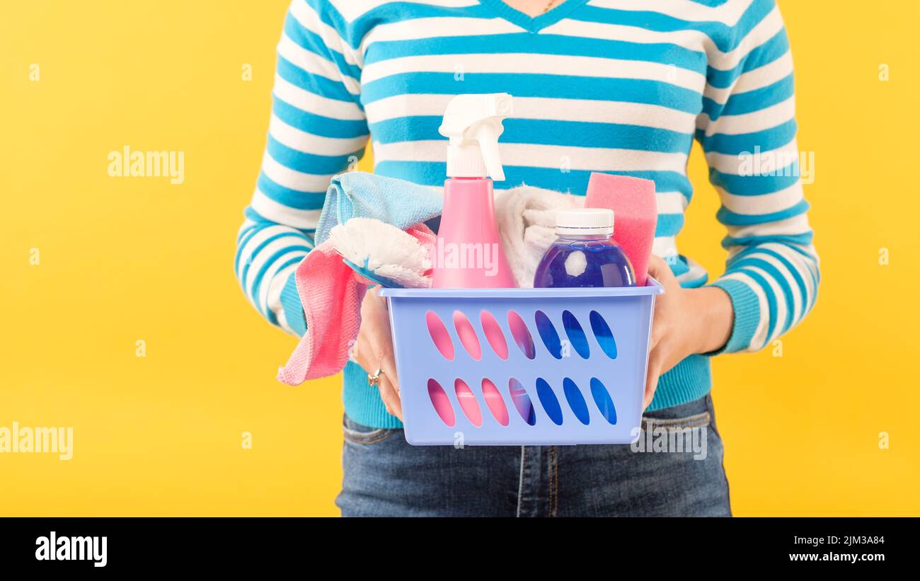 house cleanup cleaning set woman supplies basket Stock Photo - Alamy