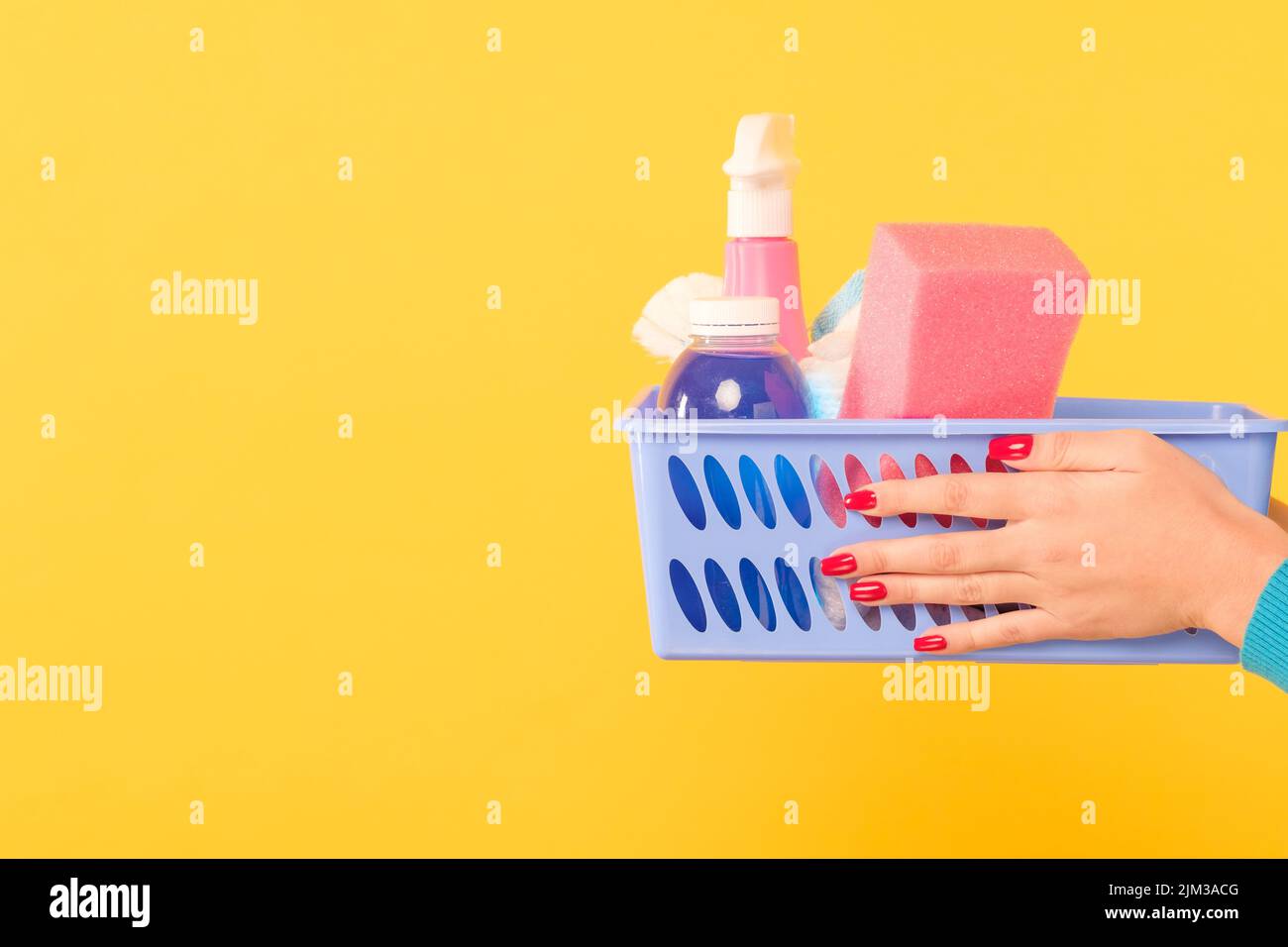cleaning products shopping basket supplies hands Stock Photo - Alamy