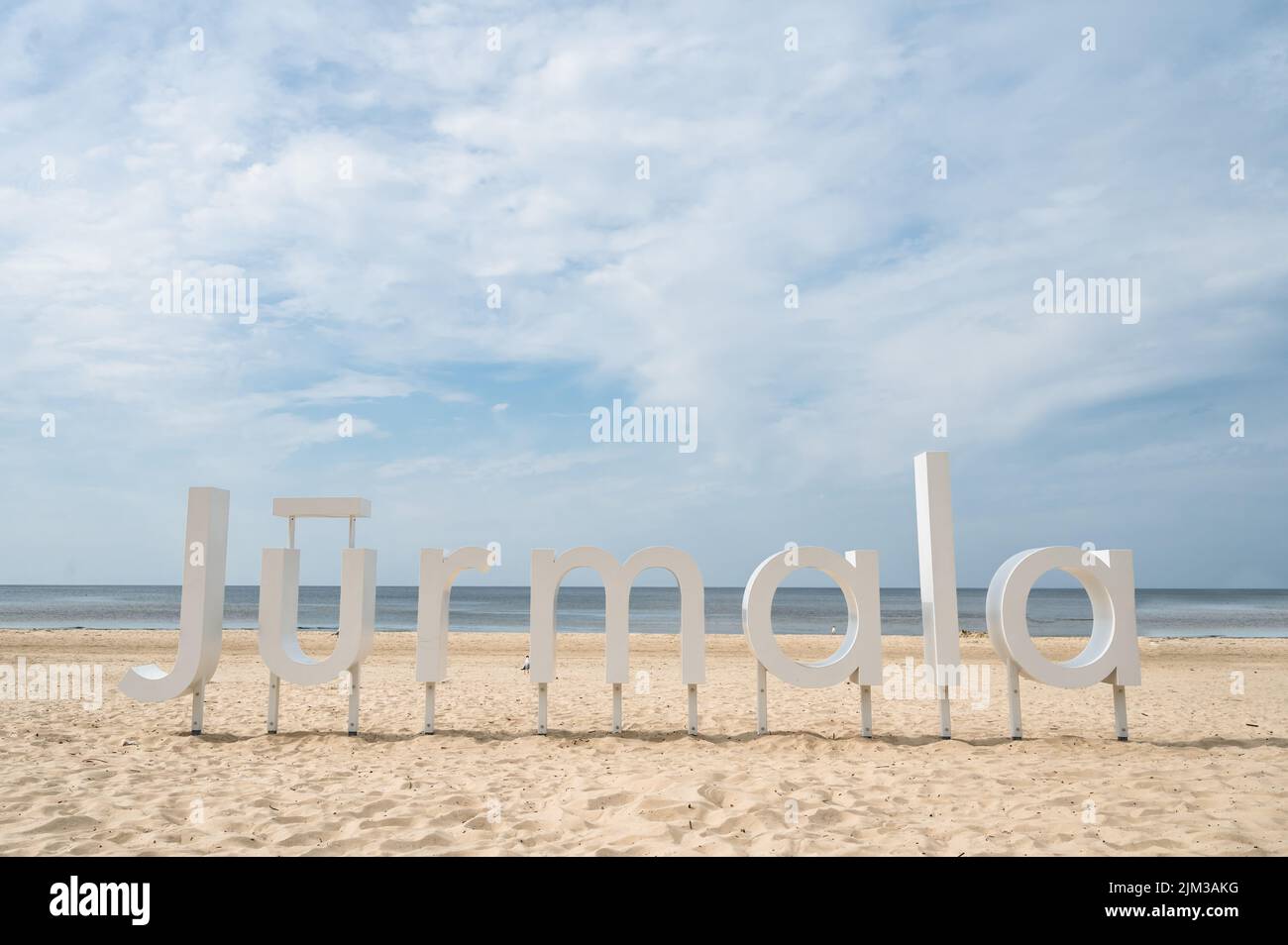 Summer holidays in Latvia. Resort Jurmala. White letters on the beach ...