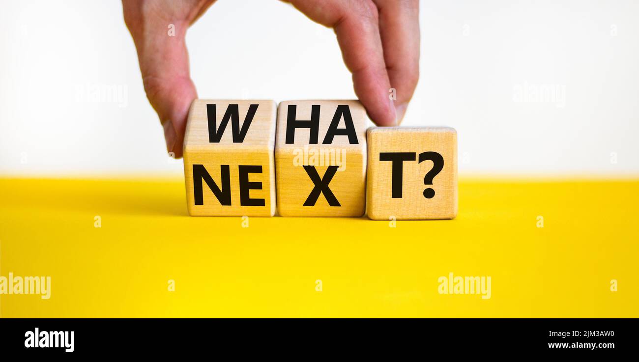 What next symbol. Concept words What next on wooden blocks. Businessman ...