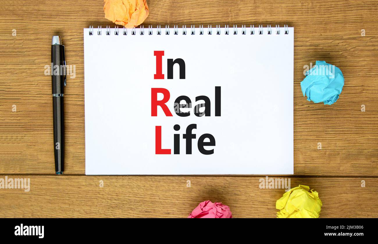 IRL in real life symbol. Concept words IRL in real life on white note ...