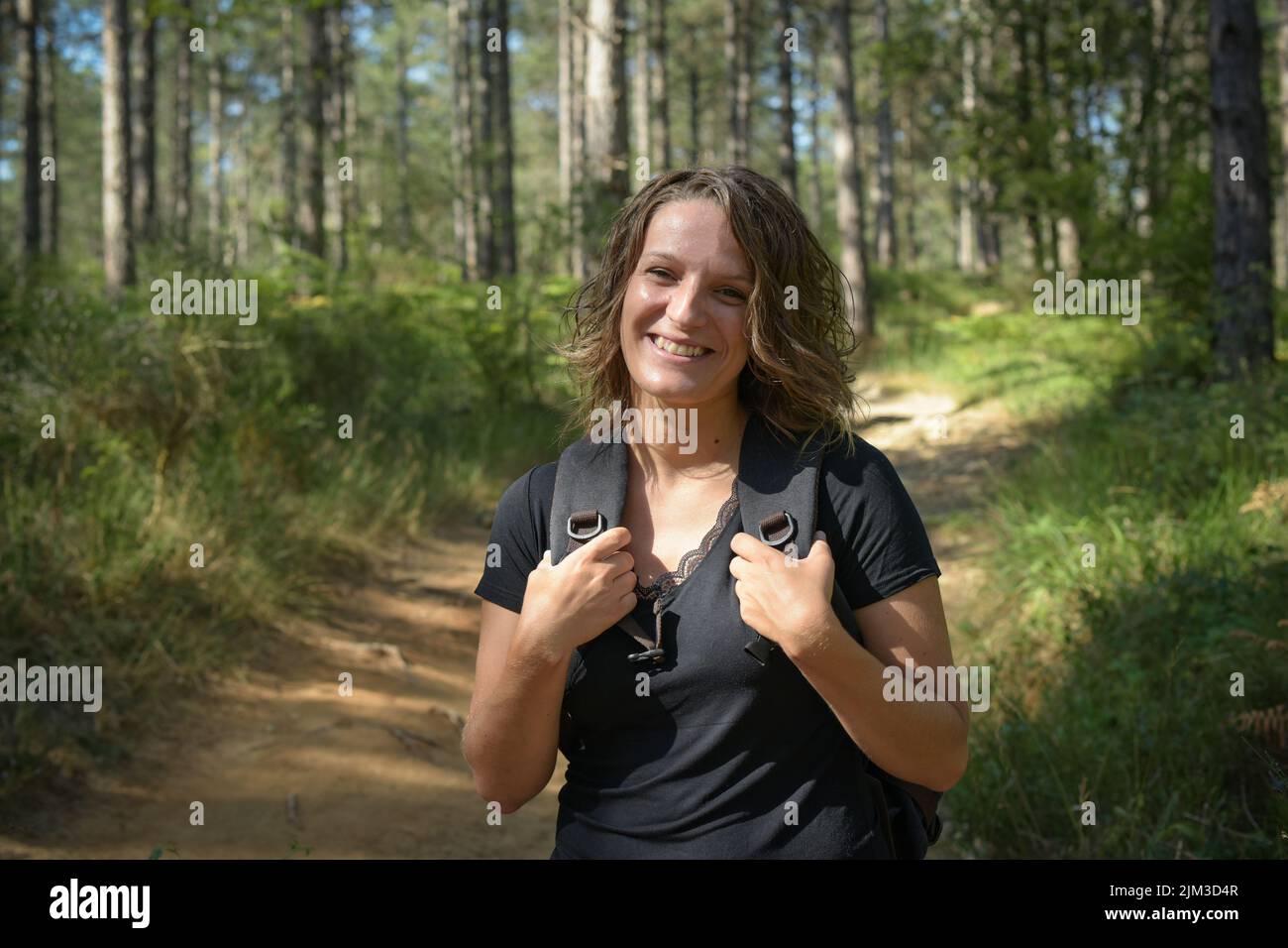 caucasian woman hiking in the french forest of Fontainebleau Stock ...