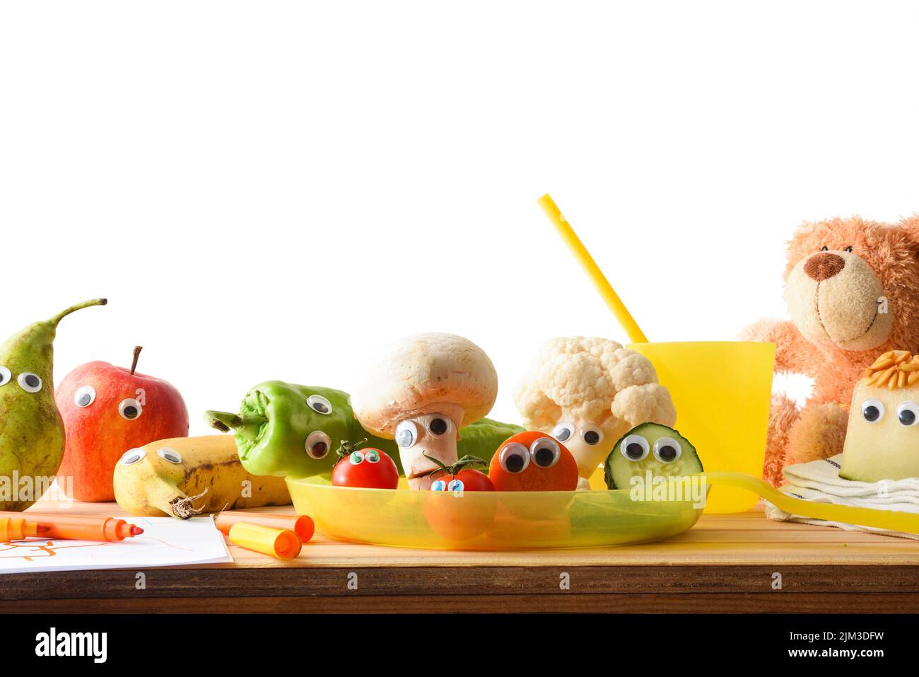 Child eating fruit table hi-res stock photography and images - Alamy