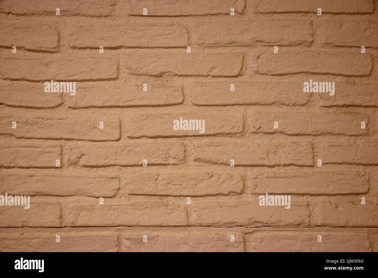 Stone texture background. Closeup of a brown brick wall texture. Abstract brick stones pattern ...
