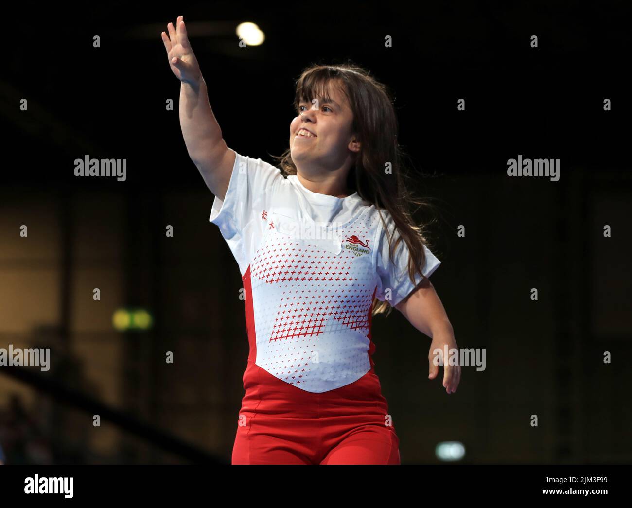 England’s Zoe Newson celebrates in the Women’s Lightweight Powerlifting ...