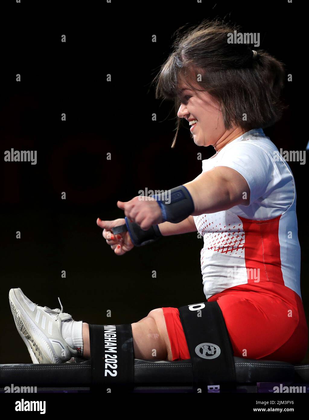 England’s Olivia Broome celebrates after completing a lift in the Women ...