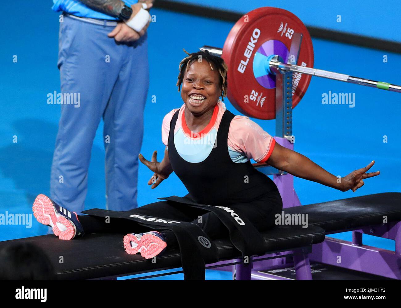 Cameroon’s Suzanne Menye Meto celebrates after completing a lift in the ...