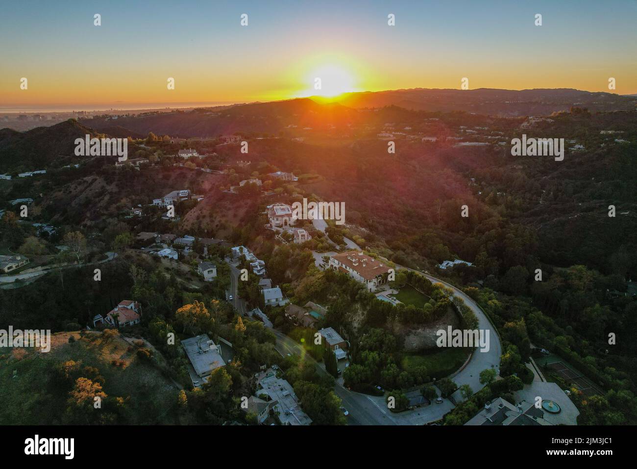 An aerial view of a sunset sky over the Hollywood area in California ...