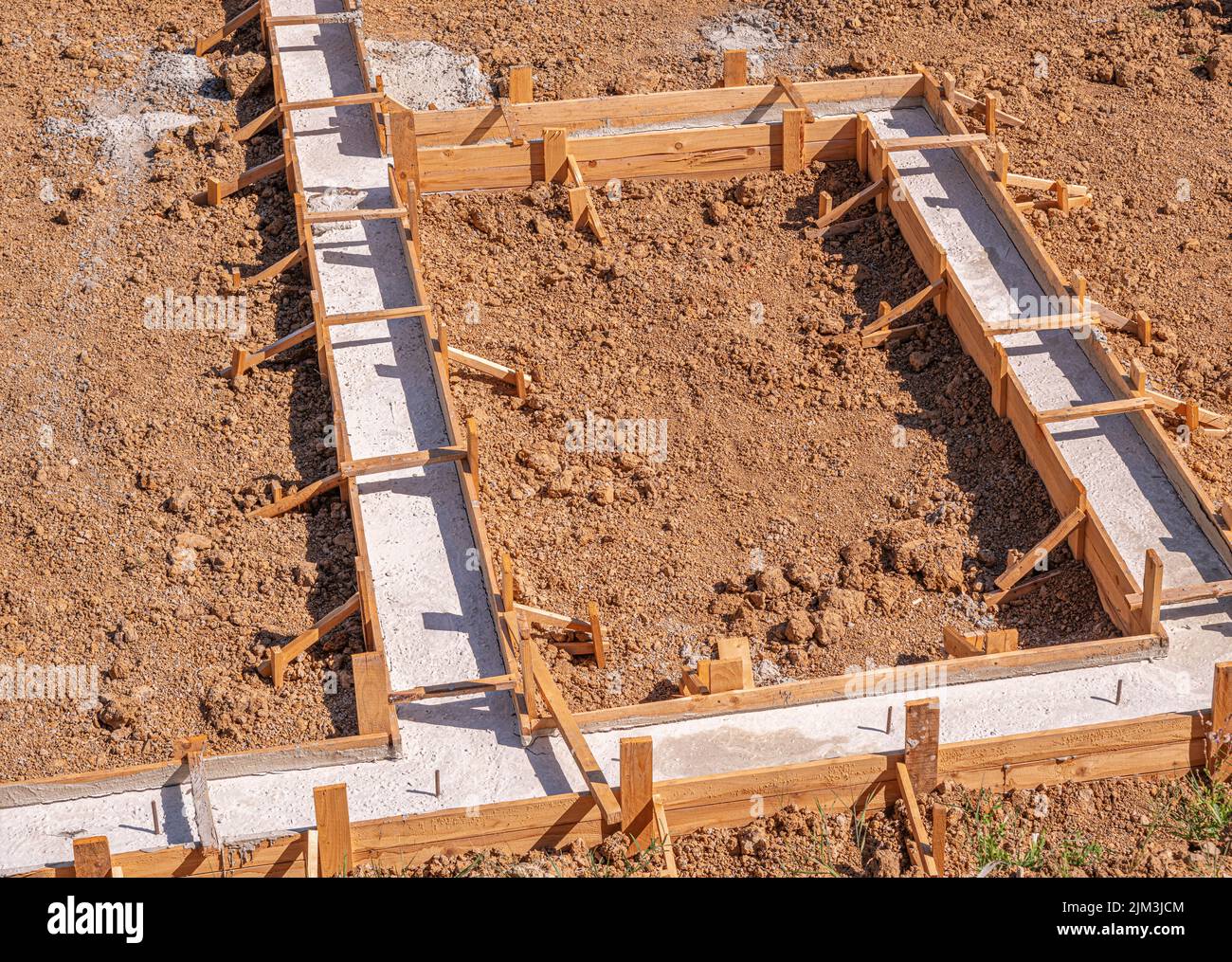 Wooden formwork for pouring concrete foundation of the house Stock ...