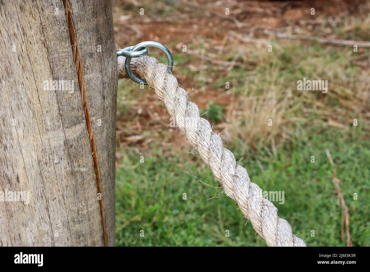 old wooden post and rope fencing in parkland Stock Photo - Alamy
