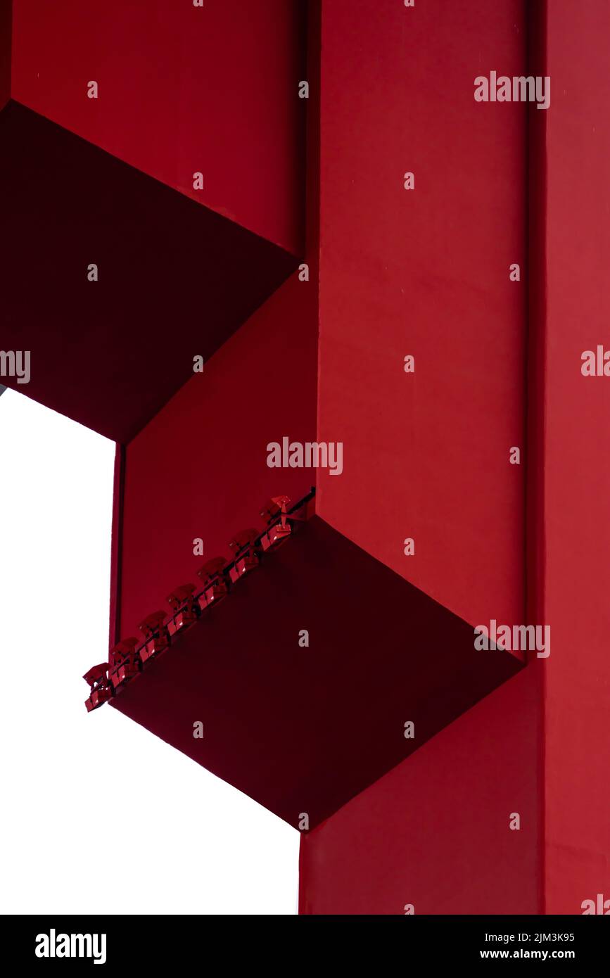 A vertical closeup shot of red modern architecture exterior with a ...