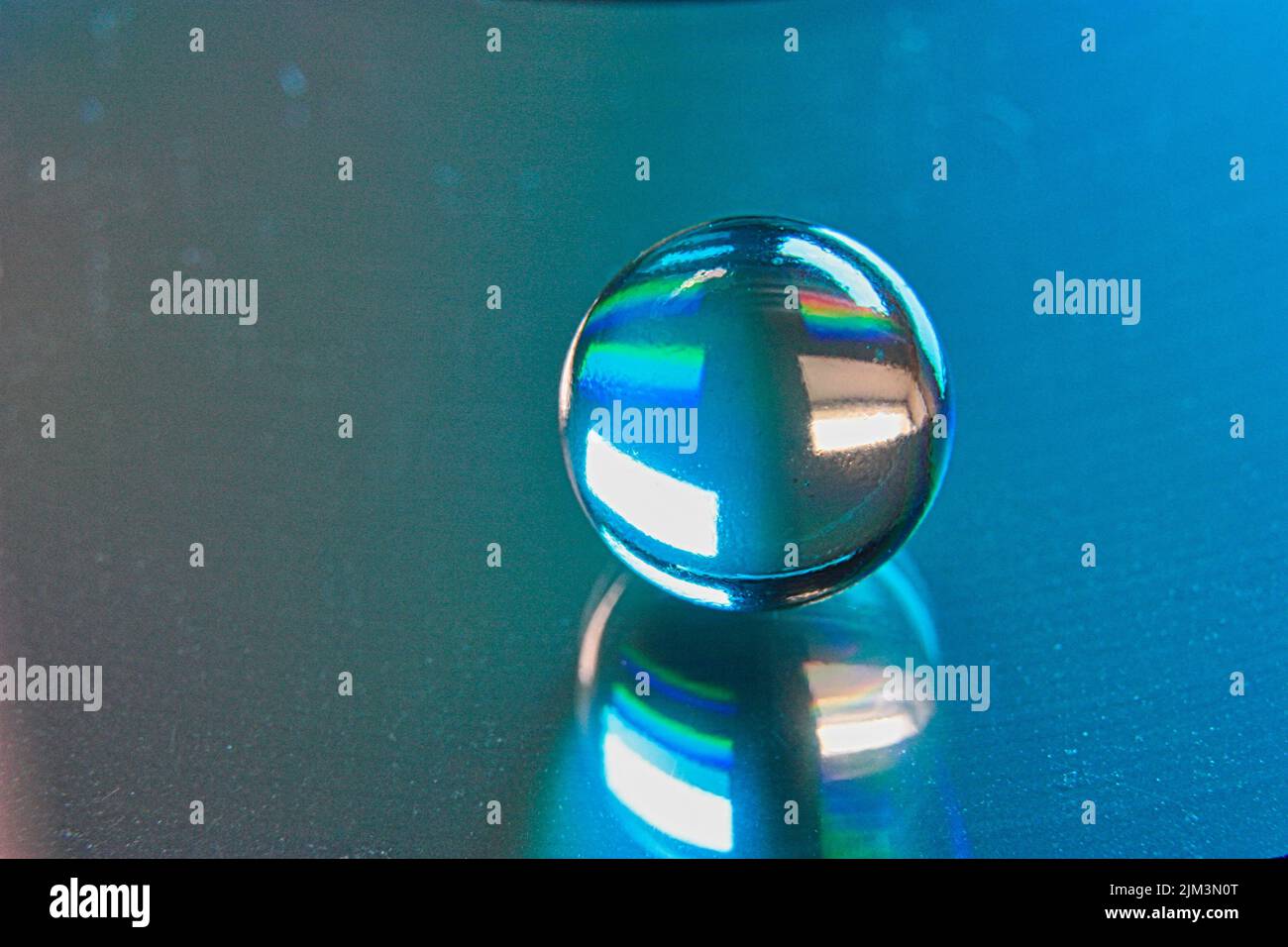 View of a mirrored sphere with reflections Stock Photo - Alamy