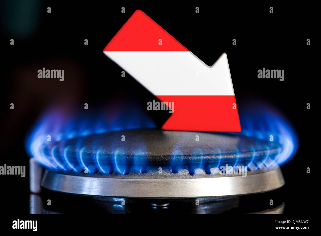 Decreased gas supplies in Austria. A gas stove with a burning flame and ...