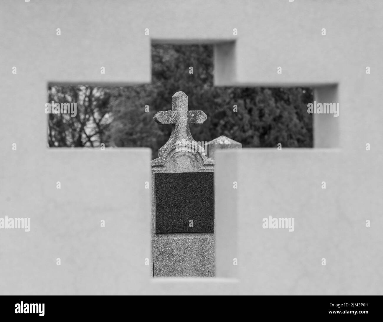 A close-up with a cross seen through another cross, stone, old Stock ...