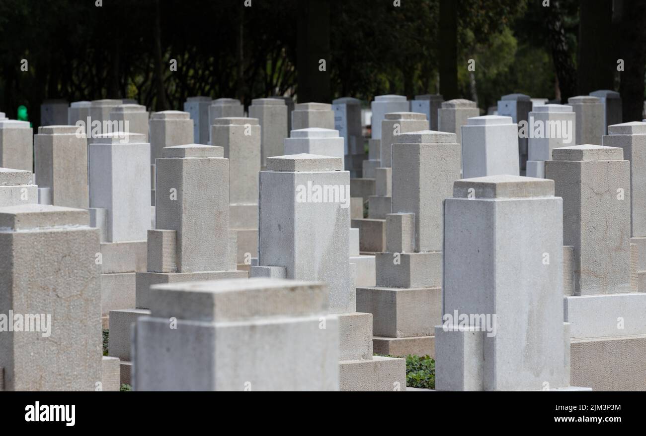 many identical tombstones in an old cemetery Stock Photo - Alamy