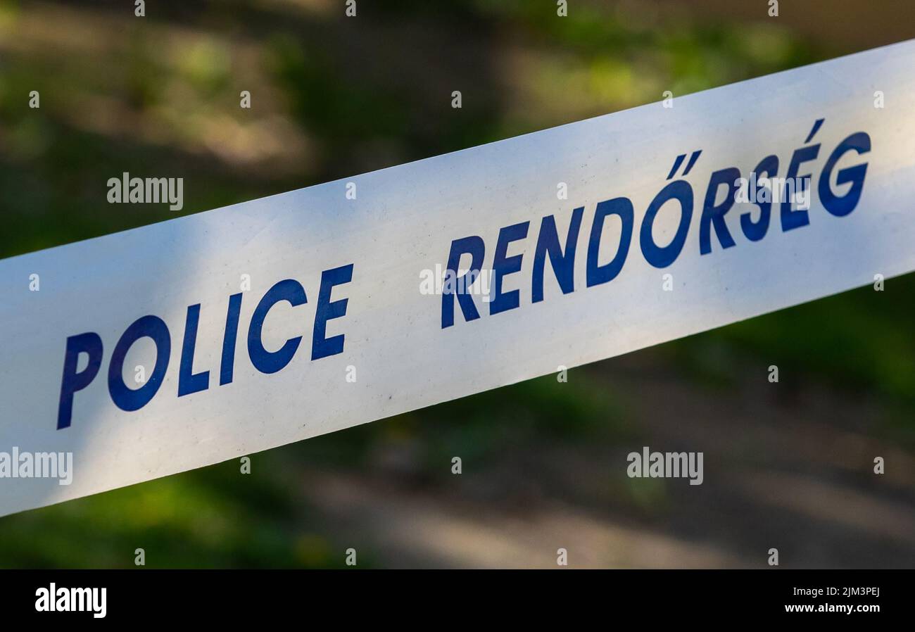 a close-up with a tape with the inscription Police in English and ...