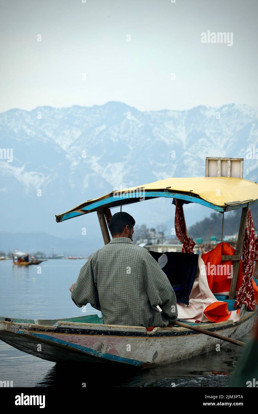 Indian man boatman rowing boat hi-res stock photography and images - Alamy