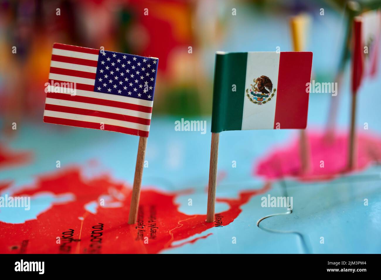 A closeup of small flags on a map Stock Photo - Alamy