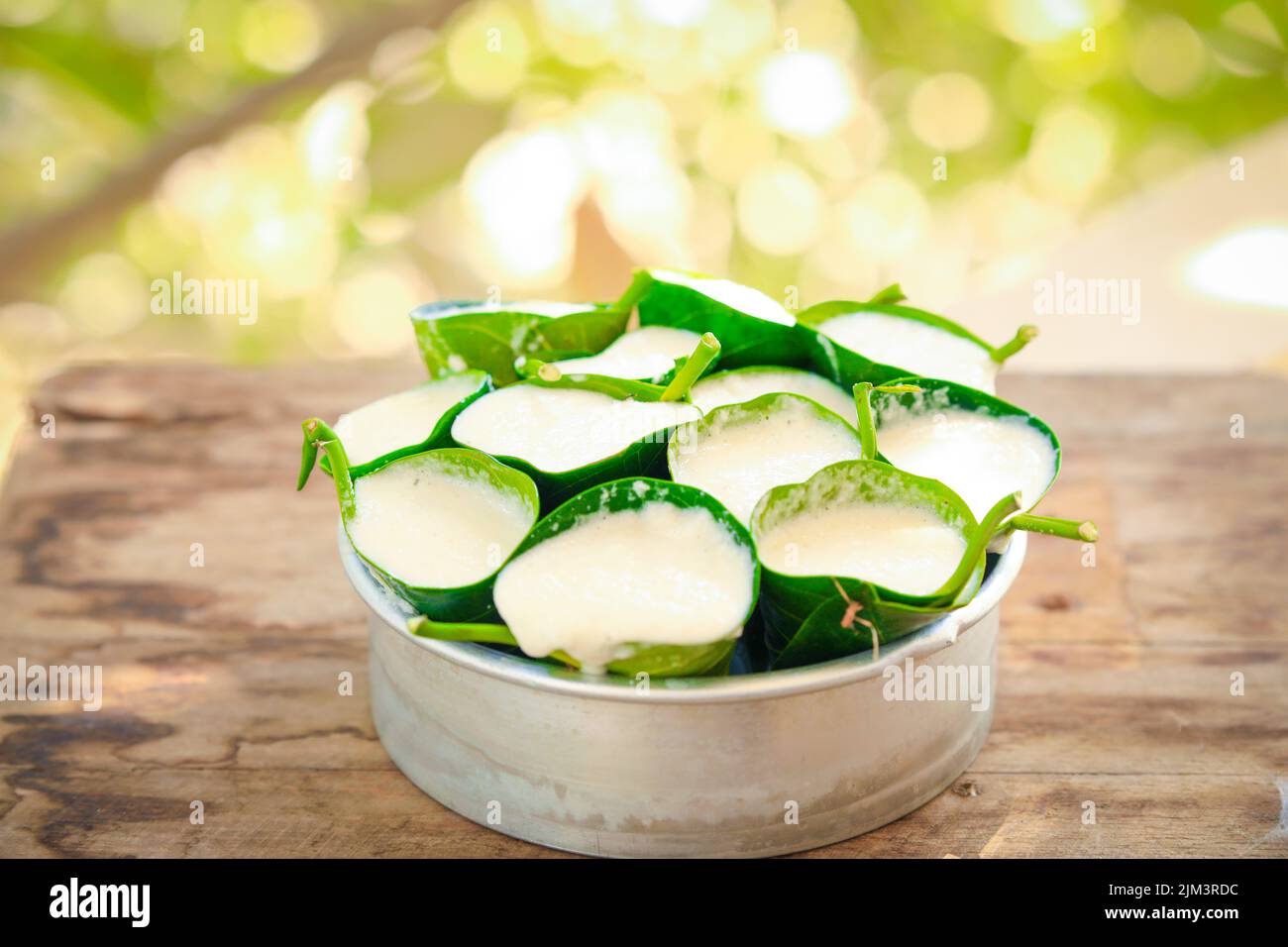steamed idly in jackfruit leaf kotte kadubu Stock Photo - Alamy