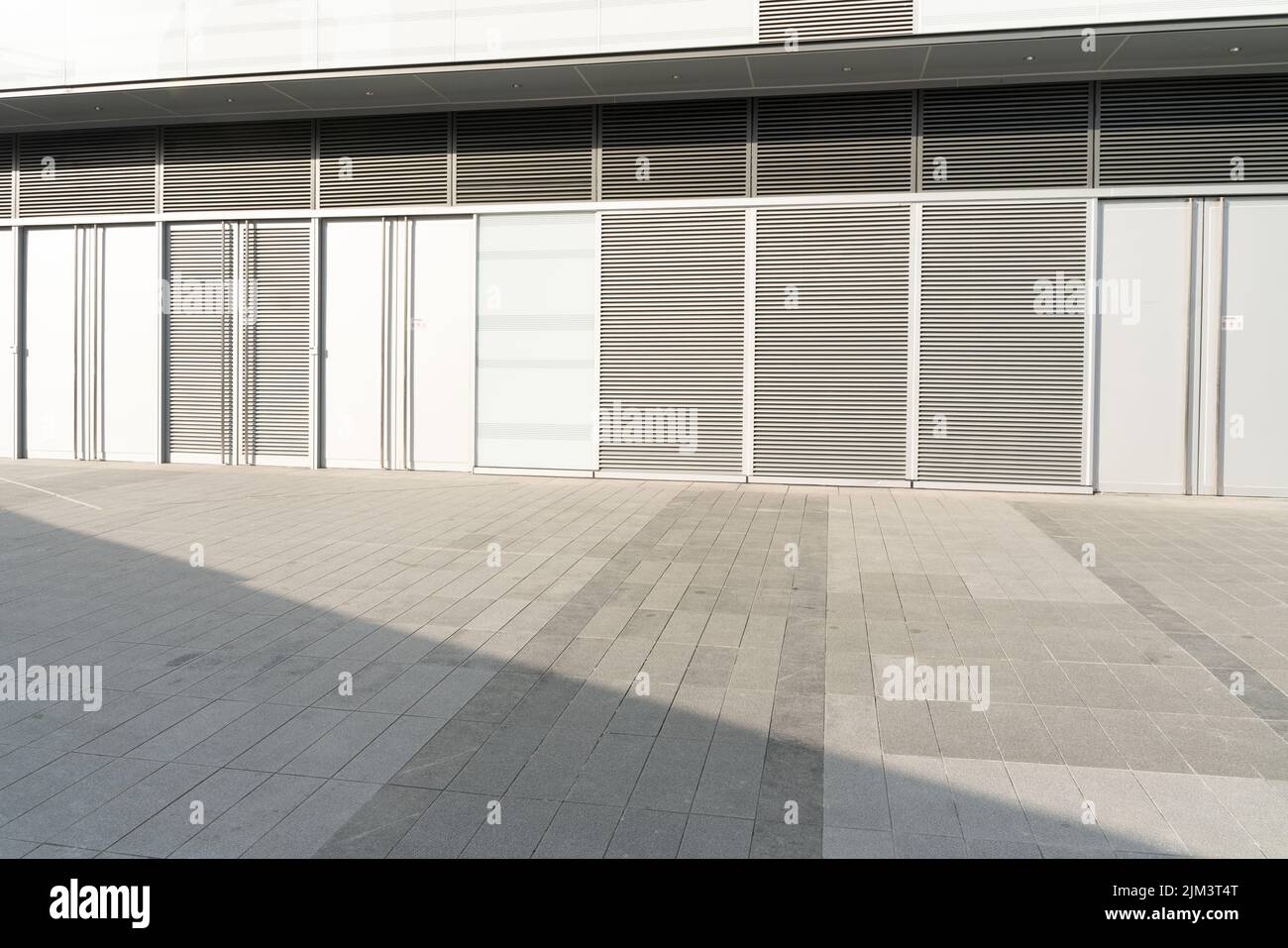 The exterior design of an empty concrete floor in downtown street of ...