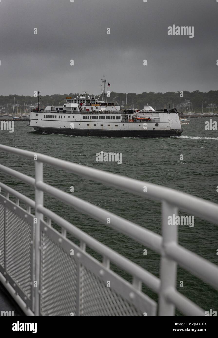 A ferry boat sailing in the ocean between Marthas Vineyard and Cape Cod ...