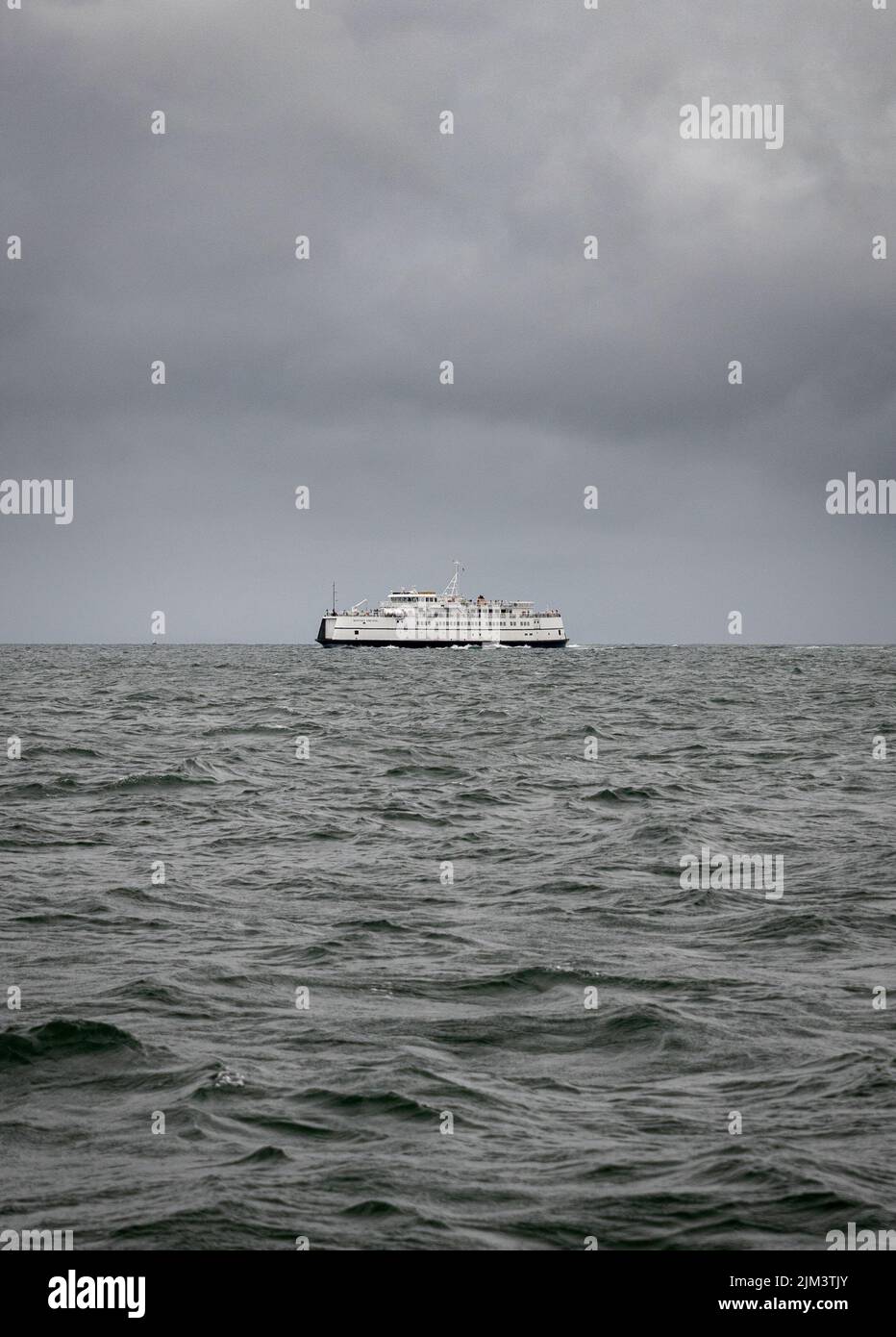 A ferry boat sailing in the ocean between Marthas Vineyard and Cape Cod ...