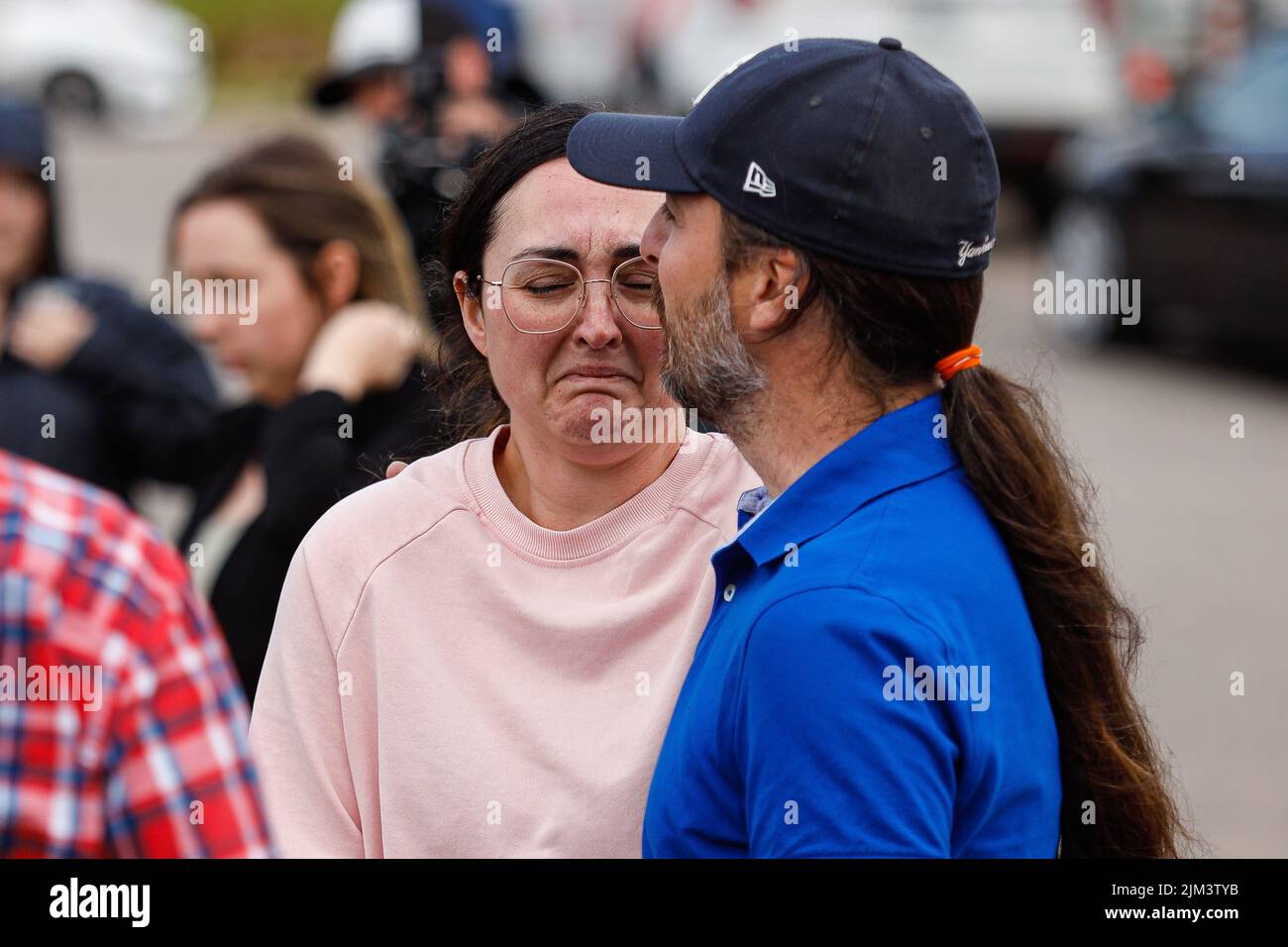 Erika Simard holds her tears as her partner Charles-David Bergeron ...