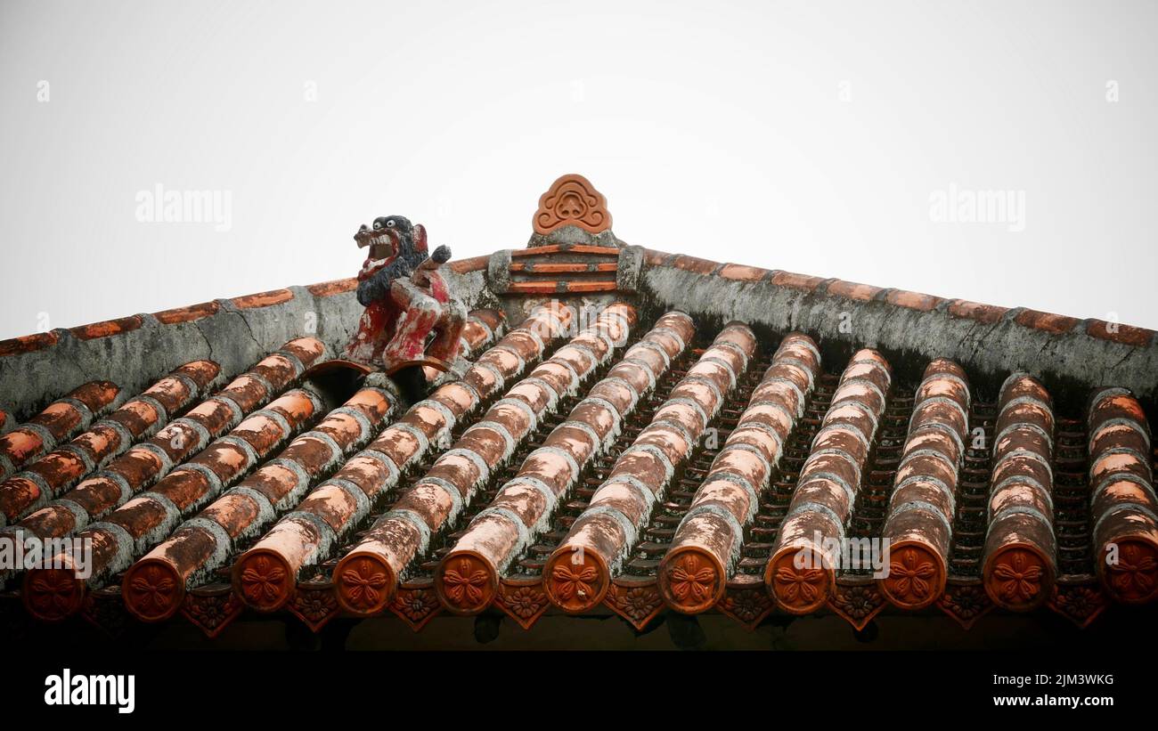 A closeup shot of the Okinawa shisha sittings on a traditional Okinawan ...