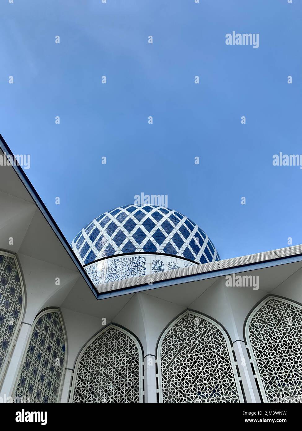 A low angle shot of the Blue Mosque in Selangor, Malaysia on a clear ...