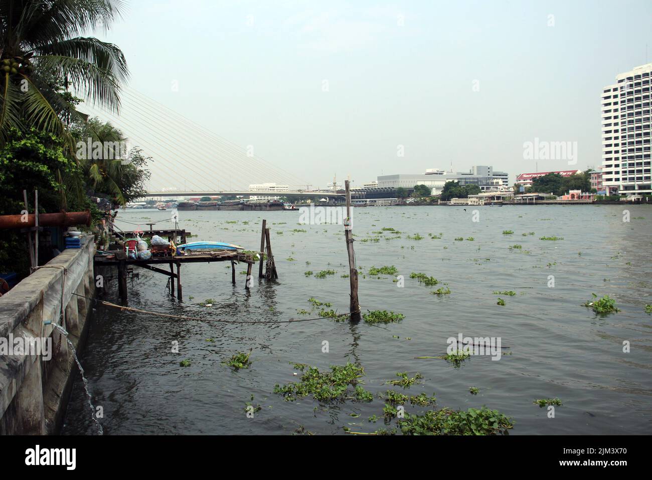 BANGKOK, THAILAND - MARCH 10, 2018 building on the banks of the Chao ...