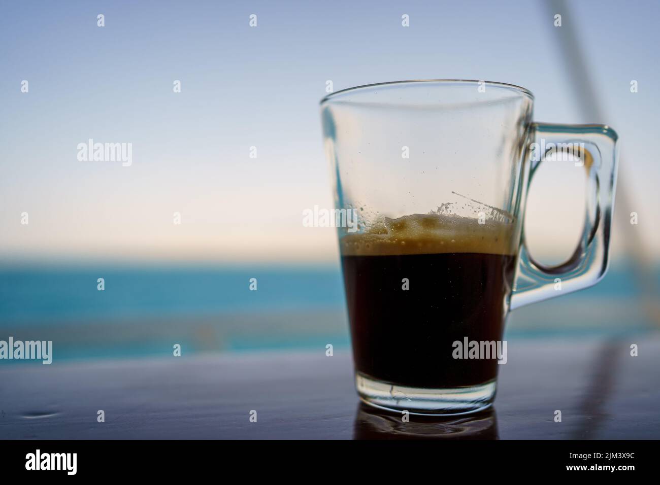 Glass of half full of coffee hi-res stock photography and images - Alamy