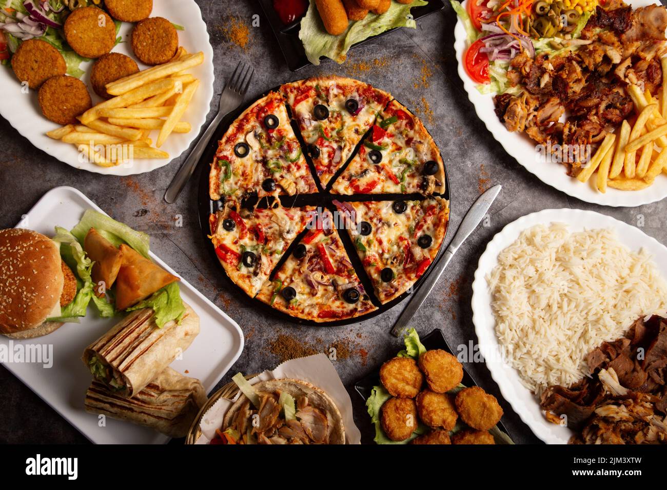 A top view of different delicious assorted dishes Stock Photo - Alamy