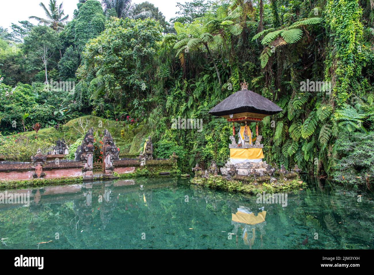 The reflection of a Hindu temple on the pond in Bali, Indonesia Stock ...