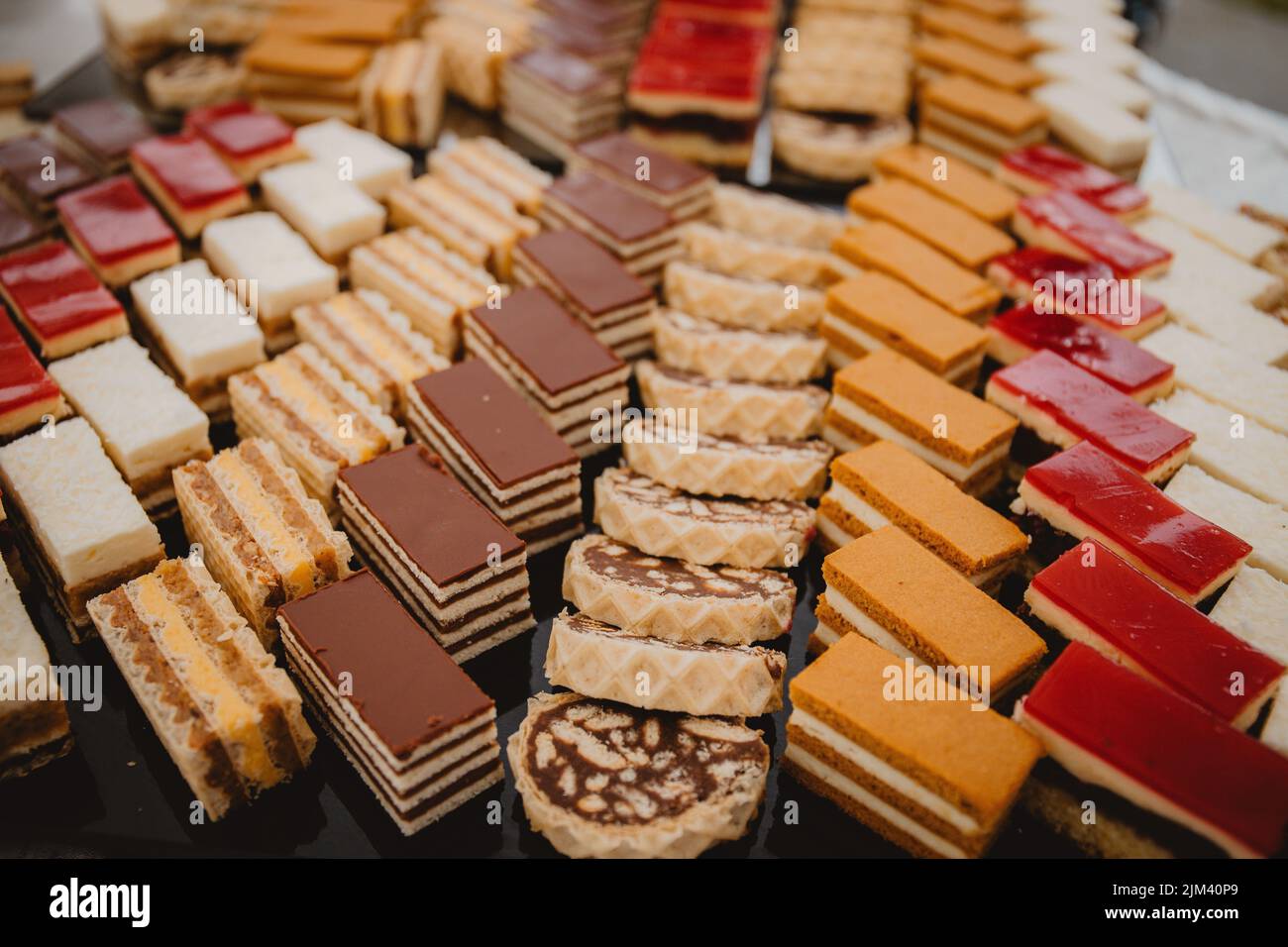 Assorted mini cakes different cream hi-res stock photography and images ...