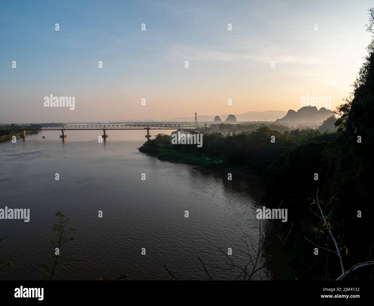 Beautiful view of Than Lwin Bridge in Hpa-An in Myanmar and the misty landscape as seen from the ...