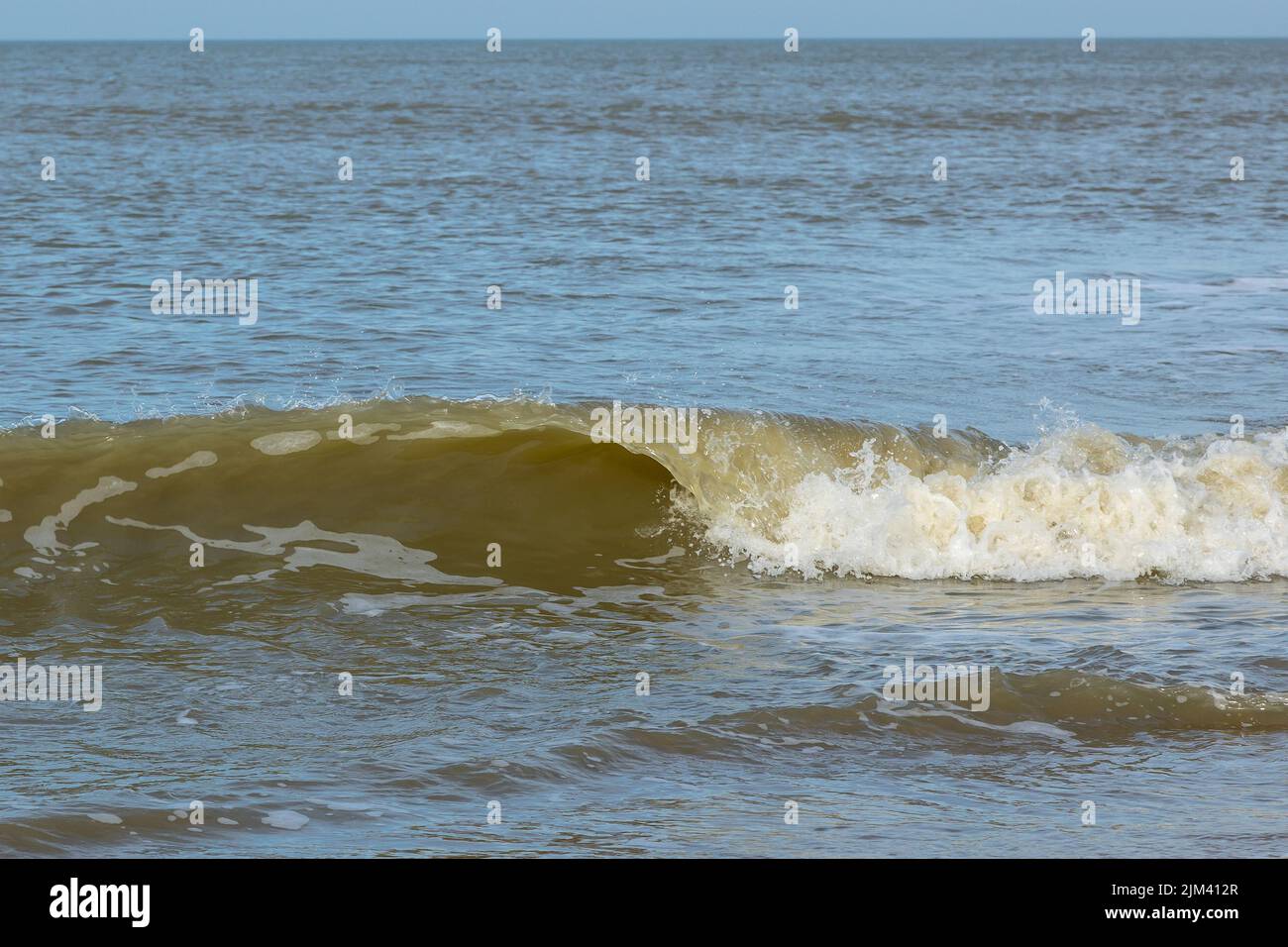 A spindrift wave close to the beach of the North Sea Stock Photo - Alamy