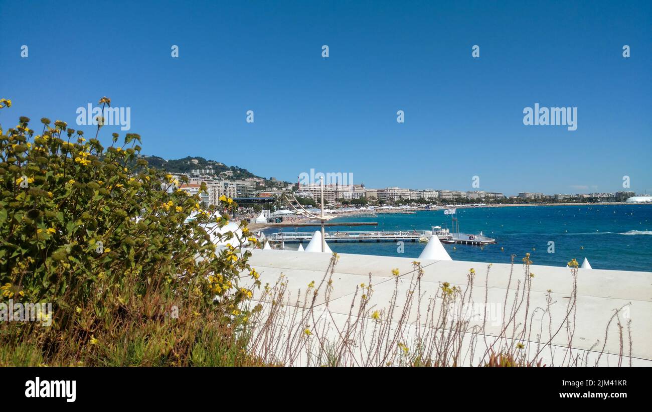 A scenic view of a seascape in blue sky background in Cannes, France ...